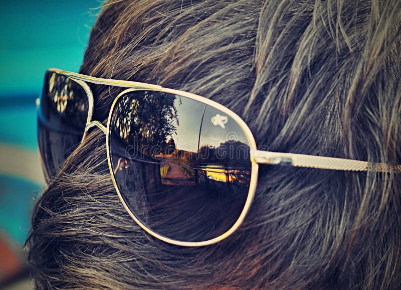 The eyeglasses on his head stock photo. Image of blue - 121505858