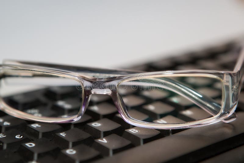 Eyeglasses with keyboard stock image. Image of occhiali - 51965815
