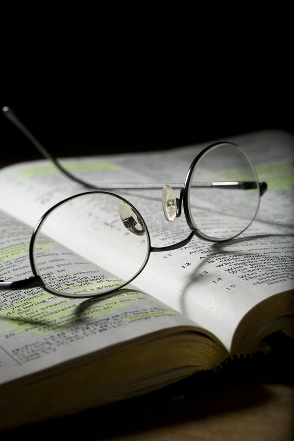 Eyeglasses on Open Bible stock image. Image of open, scriptures - 11976013