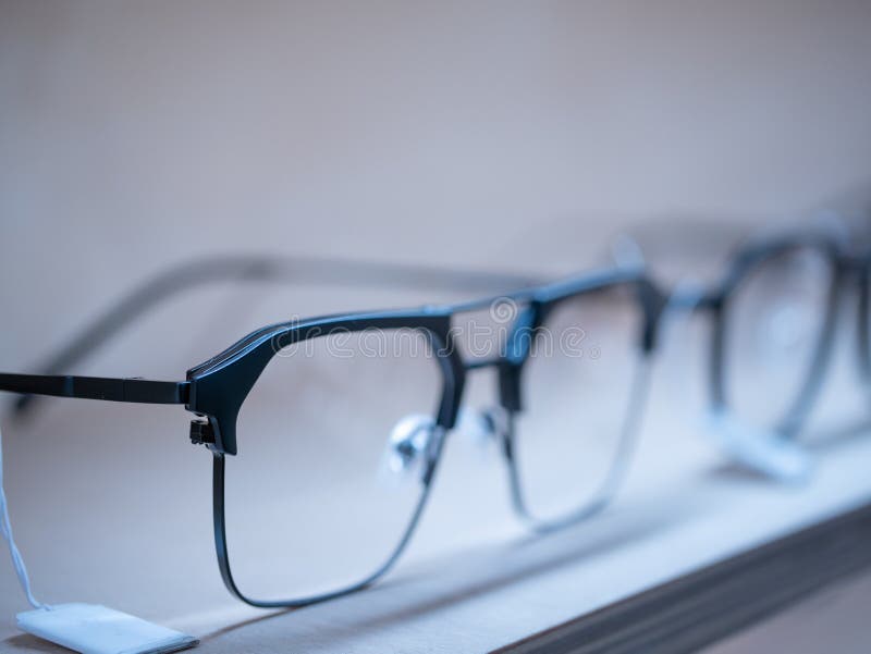 Eyeglasses on a shelf stock image. Image of eyeglasses - 291731165