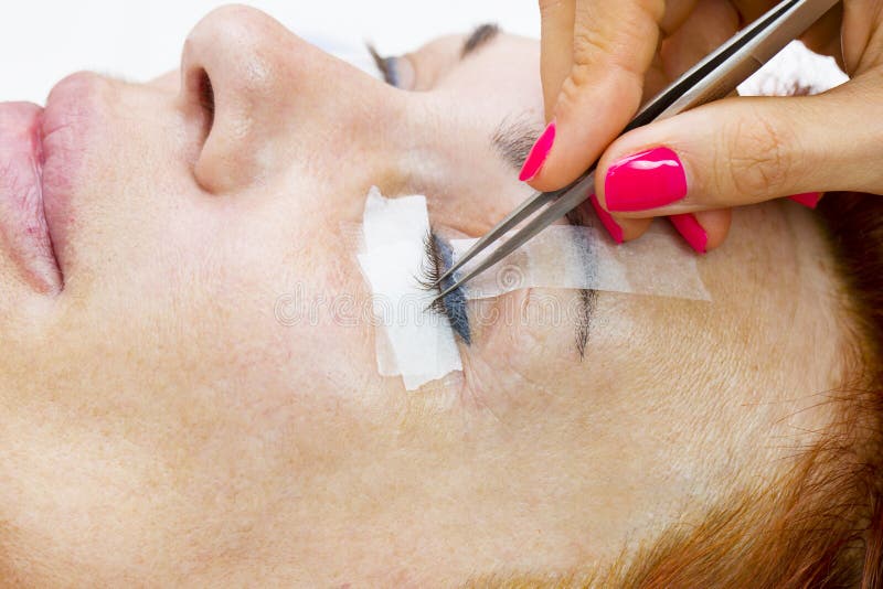 Eyelash extension process stock photo. Image of beauty - 75868168