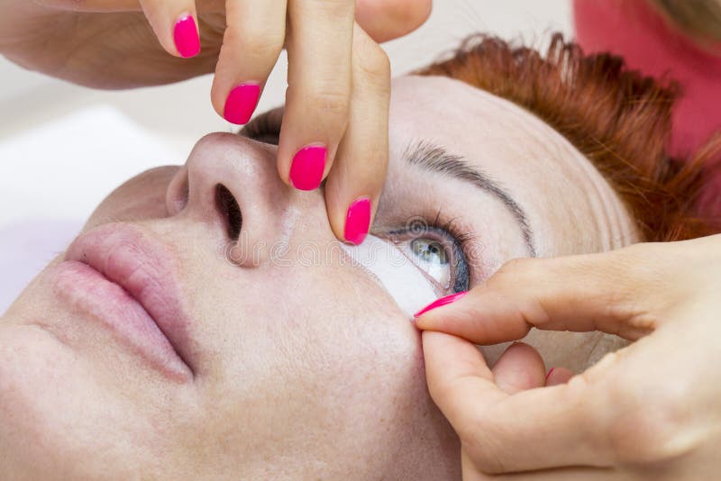 Eyelash extension process stock photo. Image of client - 76043450