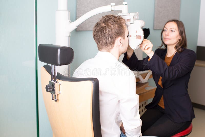 Eyes Being Checked at Store with Optician Stock Image - Image of ...