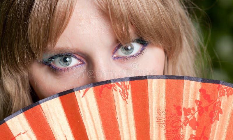 Eyes and a fan stock image. Image of comfortable, human - 25305339