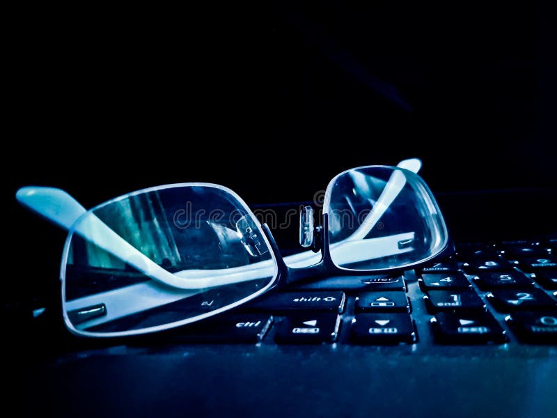 Eyes Glasses on Keyboard of Laptop Computer Stock Image - Image of ...