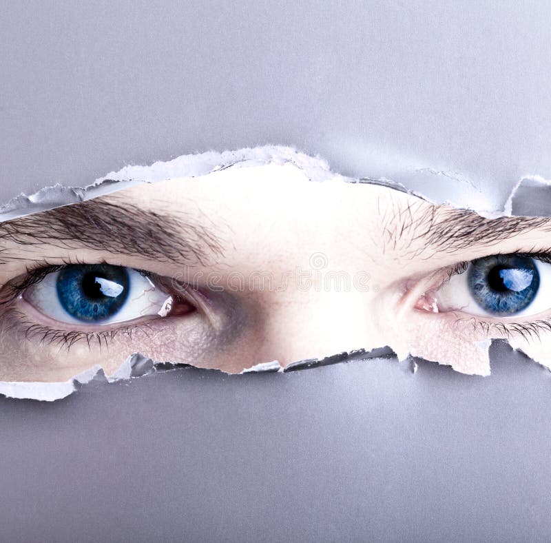 Eyes looking through gap stock photo. Image of eyebrows - 22790920