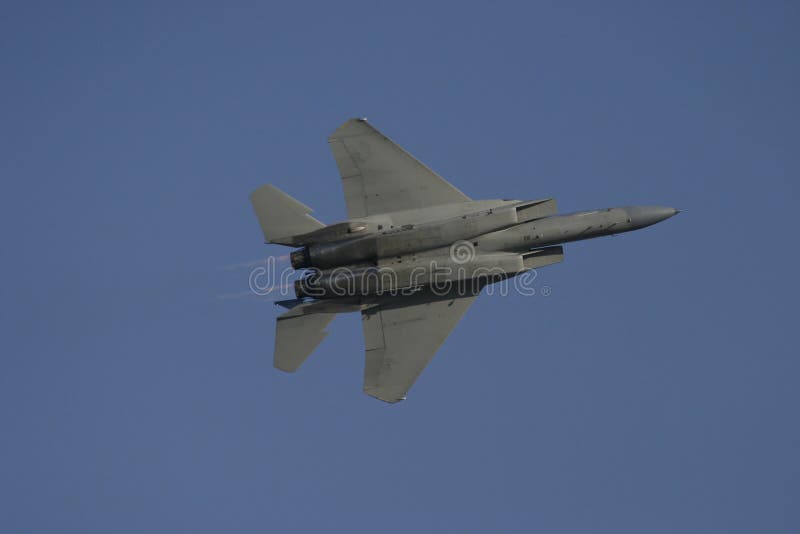 F-15 in flight from bottom stock photo. Image of fighter - 302090