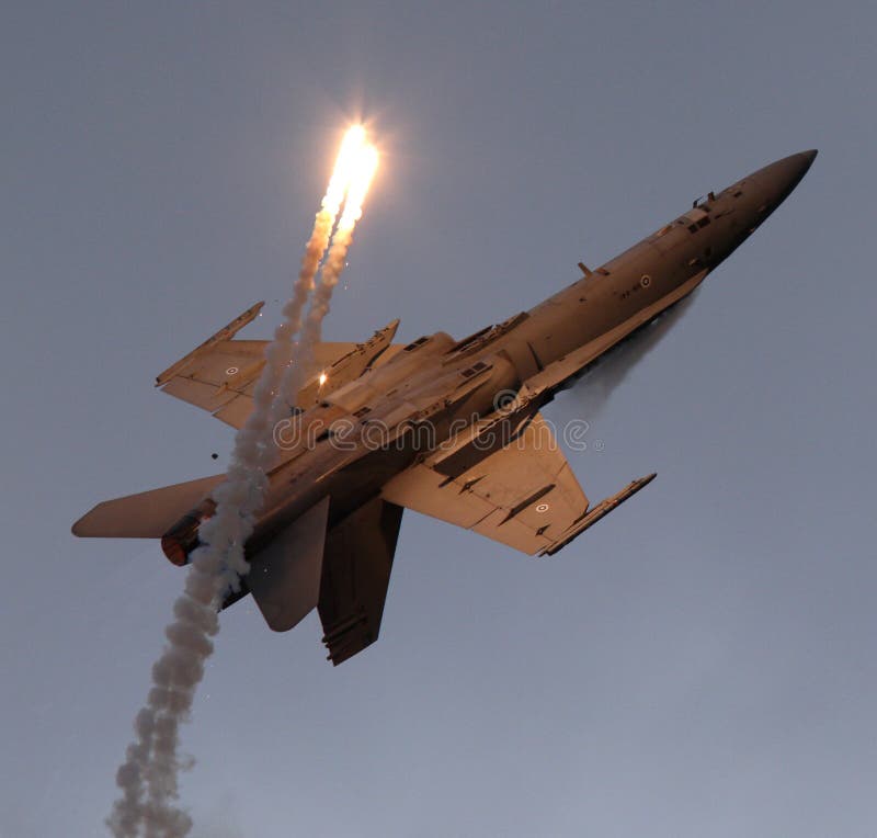 F-18 on back with flares editorial photo. Image of airshow - 30409251