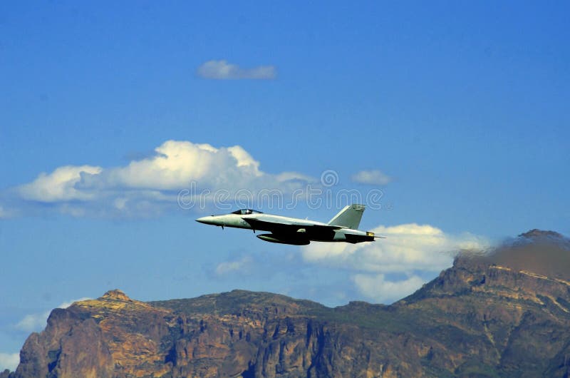 F18 Flying Near Mountains editorial stock photo. Image of mountains ...