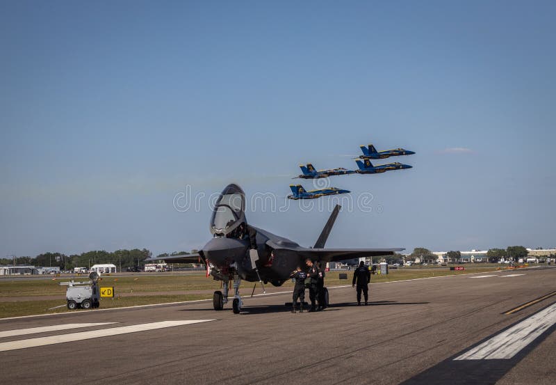F-35 Jet with Blue Angels Overhead Editorial Image - Image of precision ...