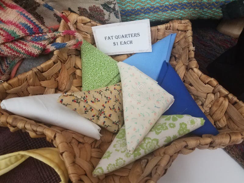 Fabric in Basket and Fat Quarters One Dollar Each Sign Stock Image ...
