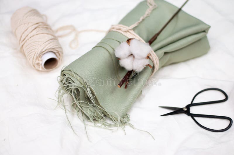 Fabric for Curtains Folded and Wrapped with Thread, Black Scissors and ...