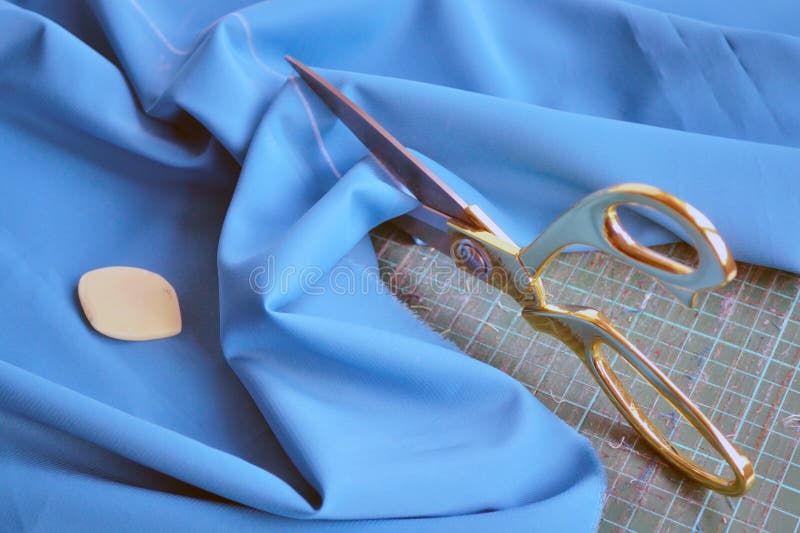 Fabric cutting to size stock photo. Image of sewing, seamstress - 69927918