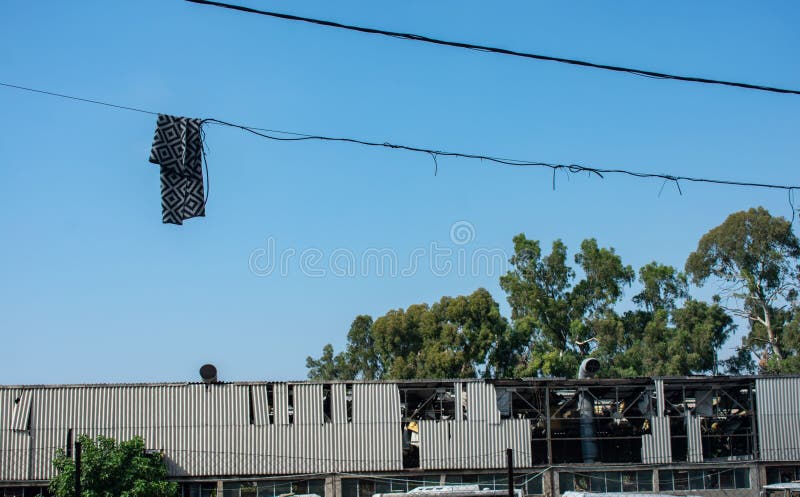 Fabric Debris on Electrical Wire and Destroyed Warehouse Editorial ...