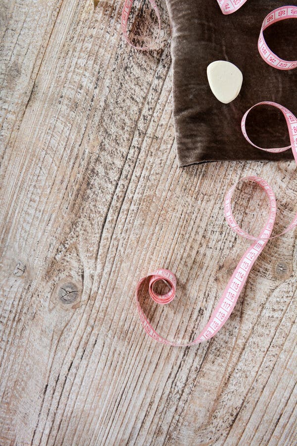 Fabric and Objects for Sewing Clothes. Roulette, Coil, and Patterns on ...