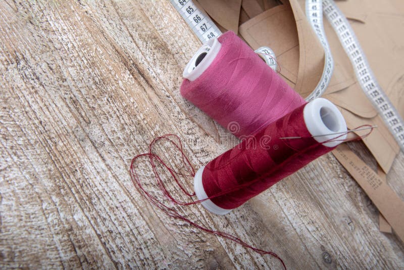 Fabric and Objects for Sewing Clothes. Roulette and Fabric on the Table ...