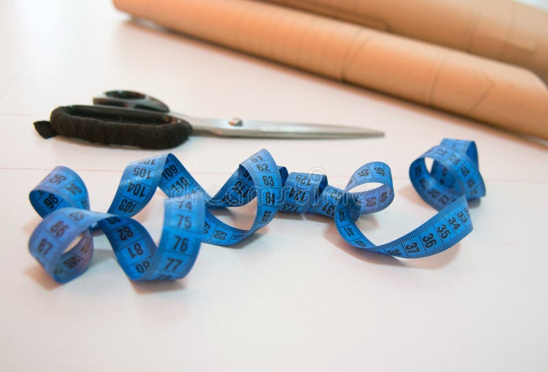 Objects for Sewing Clothes. Roulette, Coil, and Patterns on the Table ...