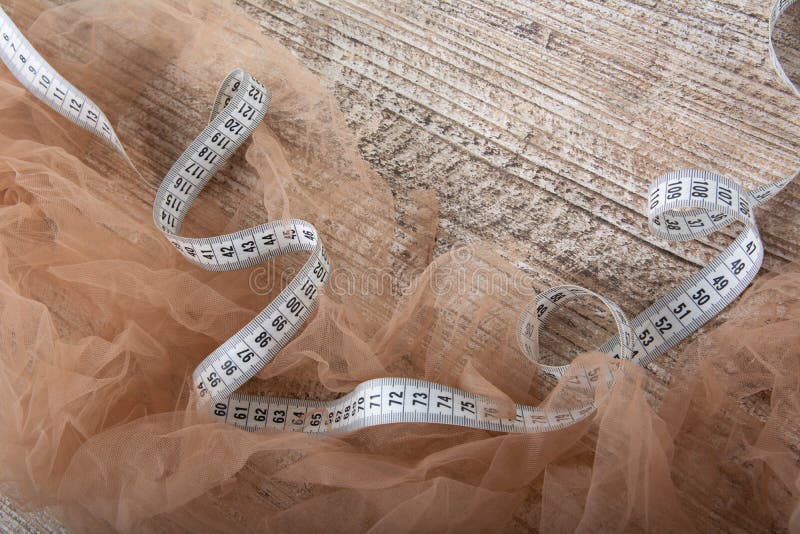 Fabric and Objects for Sewing Clothes. Roulette and Patterns on the ...