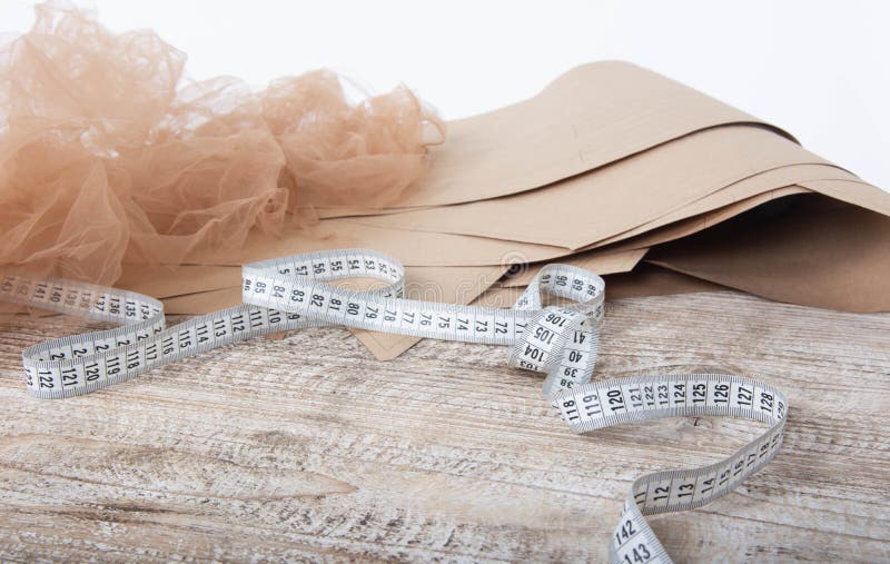 Fabric and Objects for Sewing Clothes. Roulette and Patterns on the ...