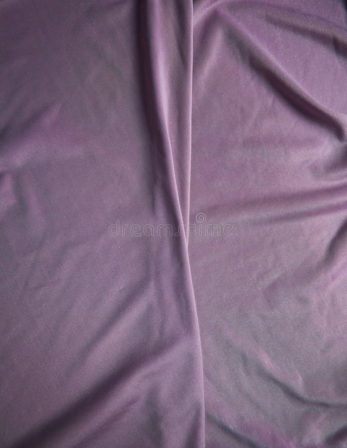 The Fabric is Pale Pink with a Matte Surface. a Crease in the Middle ...