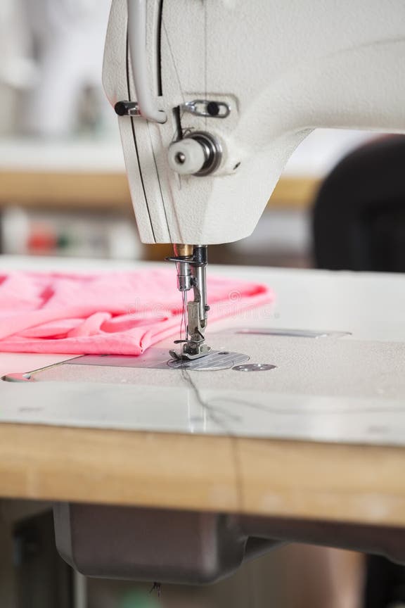 Fabric by Sewing Machine on Workbench Stock Photo - Image of still ...