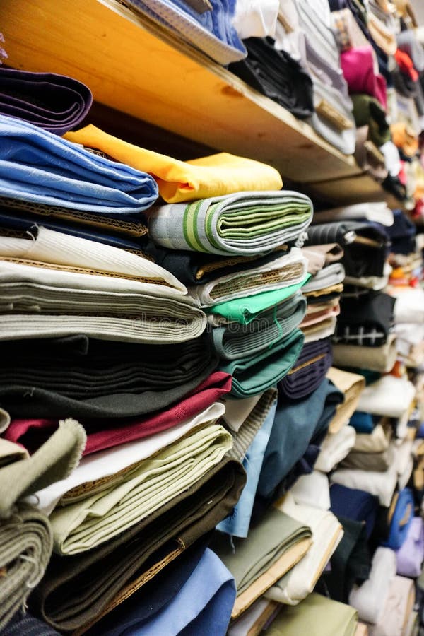 Fabric and Textile Rolls in Warehouse Stock Photo - Image of closeup ...