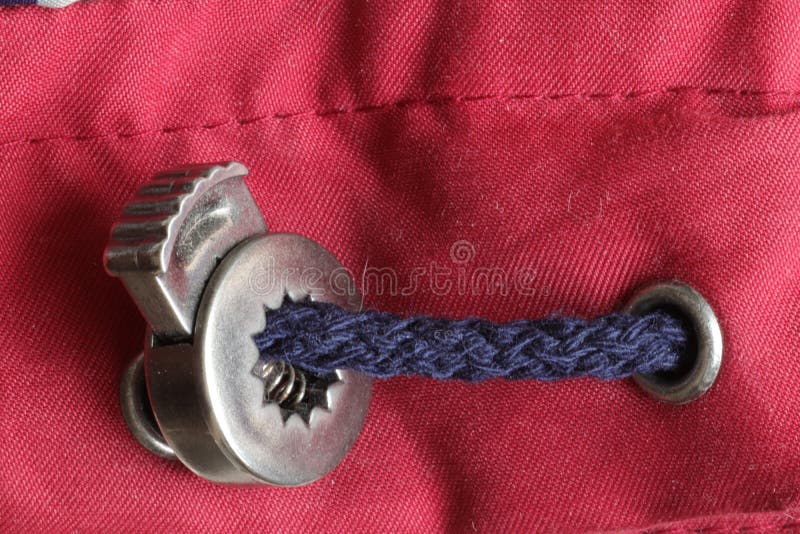 Cloth texture with clasp. stock photo. Image of design - 208500612