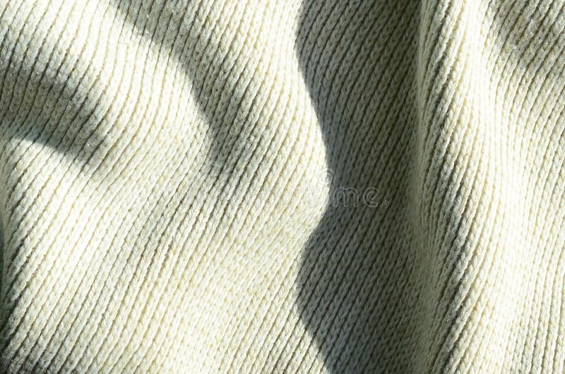 Fabric Texture of a Soft Yellow Knitted Sweater. Macro Image of the ...