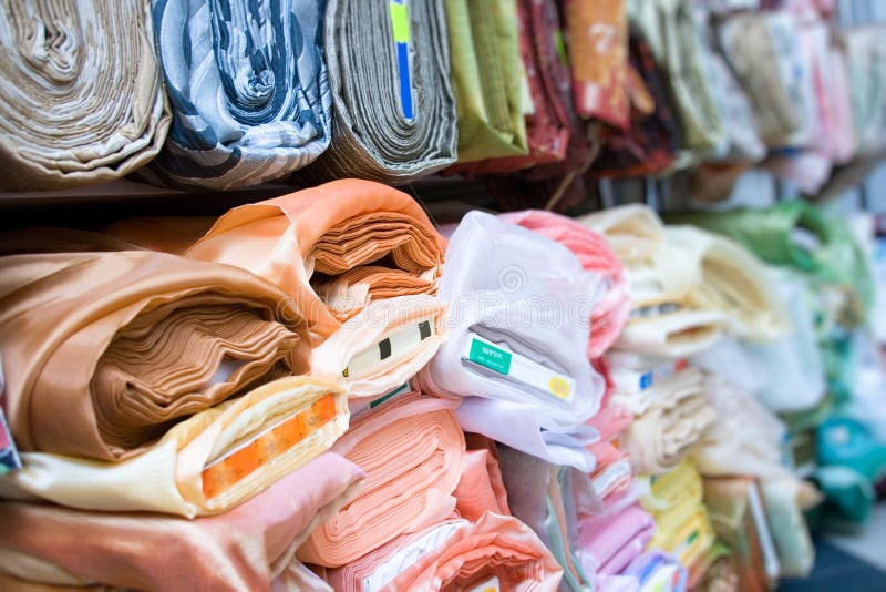 Fabric Tubes Textile Rolls in the Fabric Shop Stock Photo - Image of ...