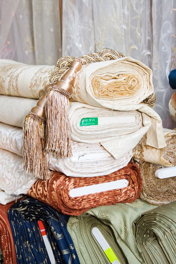 Fabric Tubes Textile Rolls in the Fabric Shop Stock Photo - Image of ...