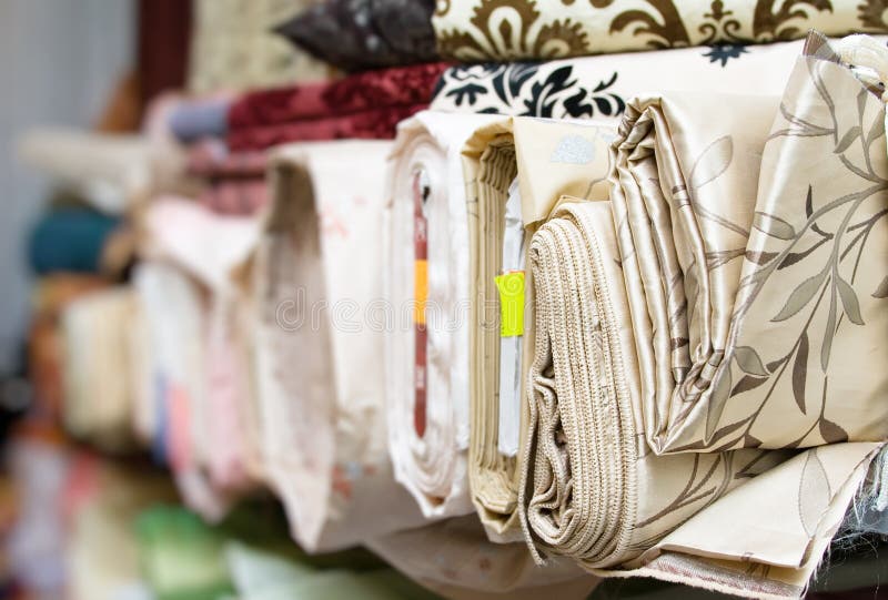 Fabric tubes Textile rolls stock photo. Image of pile - 90540956