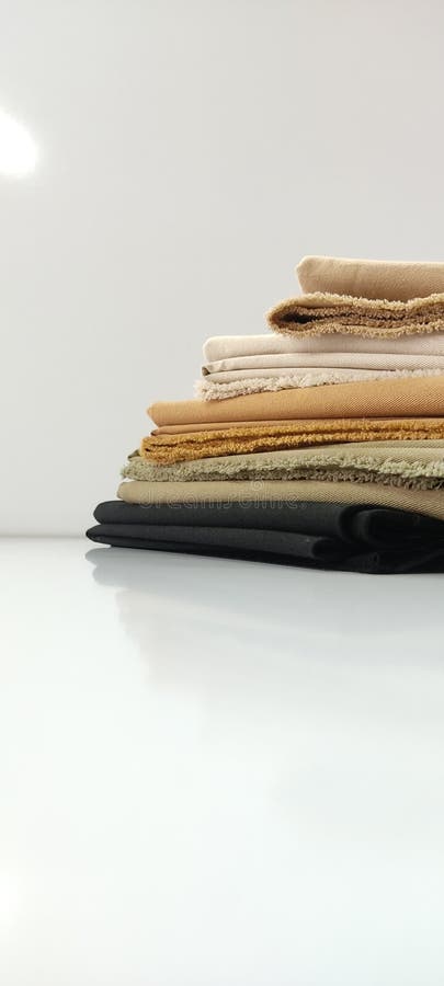 Fabrics Arranged on Top of Each Other in a Disorderly Manner in Cream ...