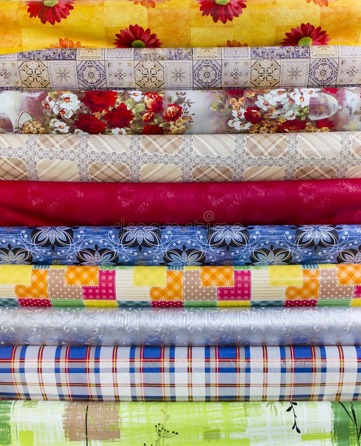 Stack Of Assorted Folded Fabrics Stock Photo - Image of rolls, fabric ...