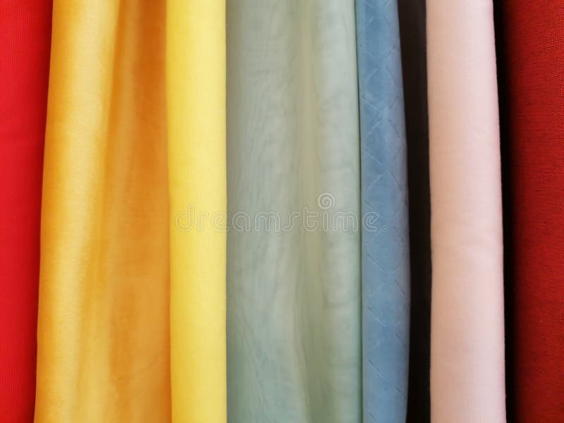 Fabrics of Different Colors in the Foreground Stock Photo - Image of ...