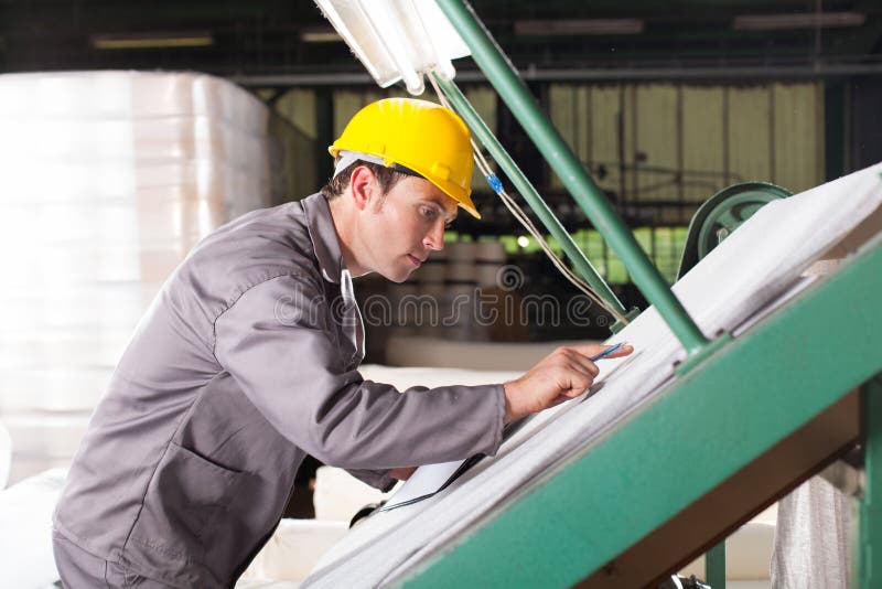 Checking fabrics quality stock photo. Image of manufacturing - 27311156