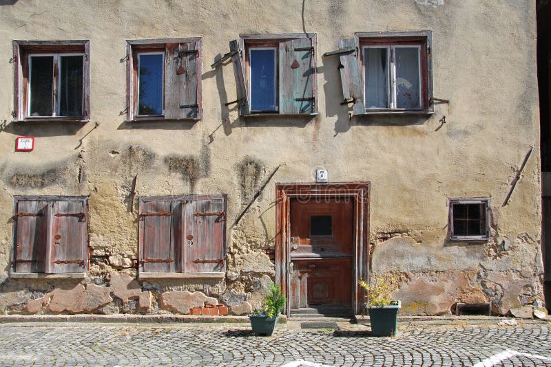 Simple old house facade. stock image. Image of europe - 16410243