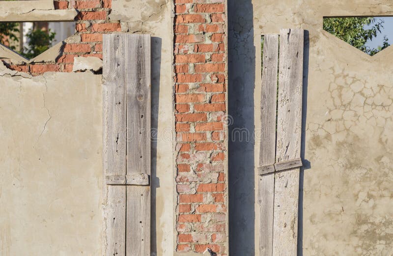 Facade of Abandoned Building with Three Doors. Stock Image - Image of ...