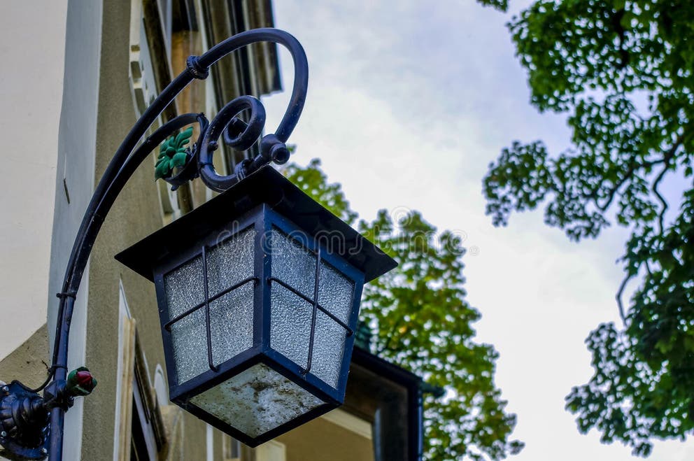 Facade of Ancient Sepia Building with Lantern at Night Stock Photo ...