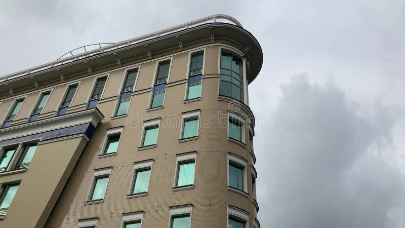 Facade of Architectural Building Against Cloudy Sky in Downtown ...