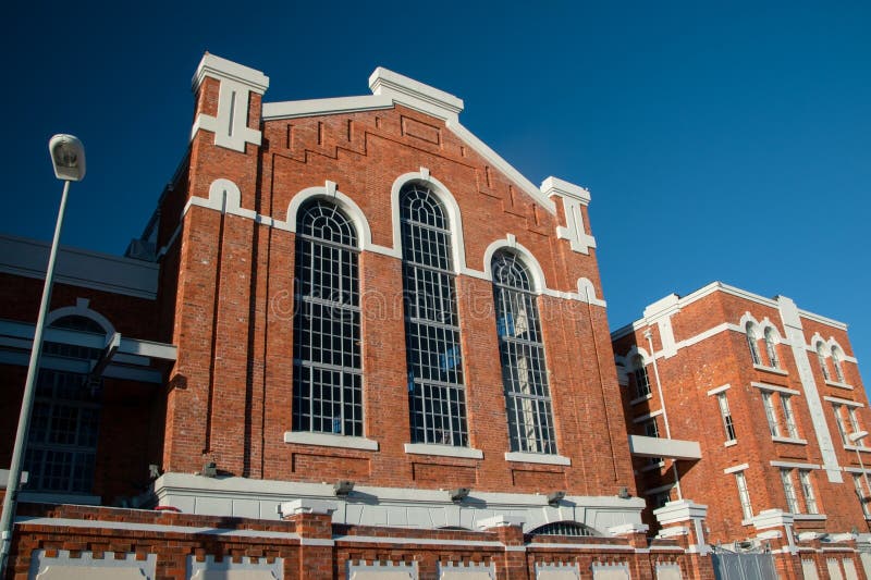 Facade of a Brick Building with Large Windows Stock Image - Image of ...