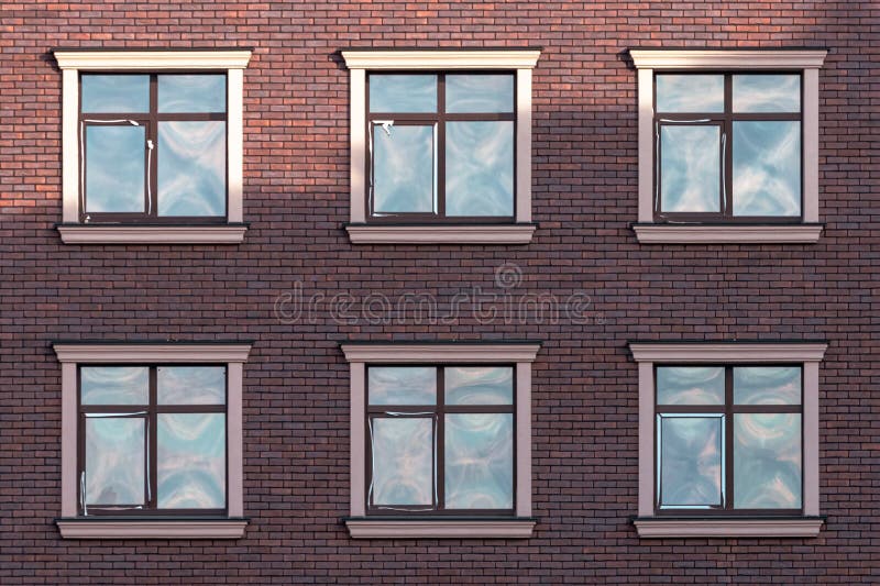 The Facade of a Brick House with Identical Square Windows Stock Photo ...