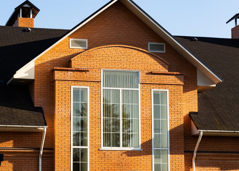 Facade of Brick Mansion with Three Rectangular Windows, Chimney and ...