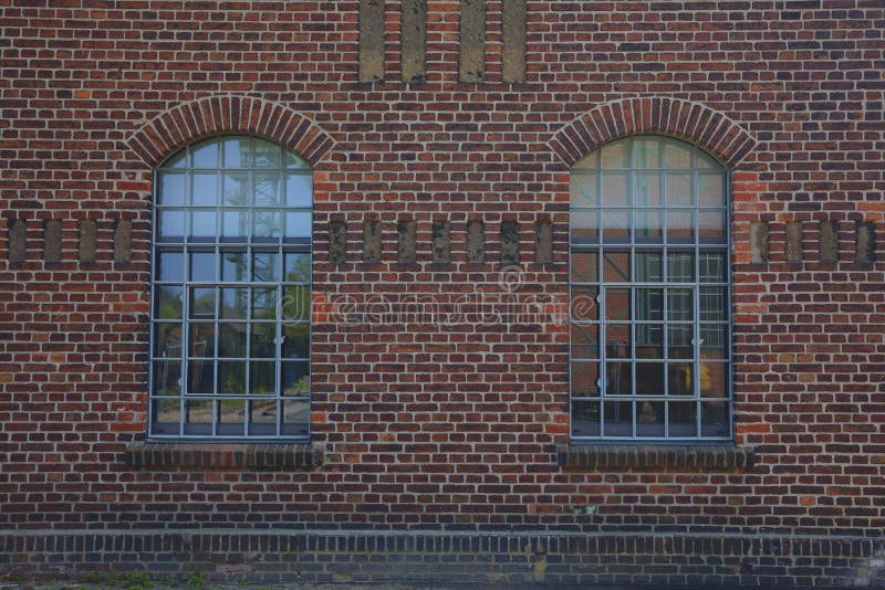 Facade of a Brick Wall with Two Windows Stock Image - Image of historic ...