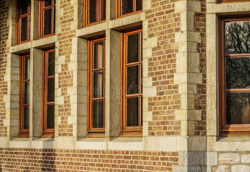 Facade from Bricks with Windows. Stock Image - Image of belgium ...