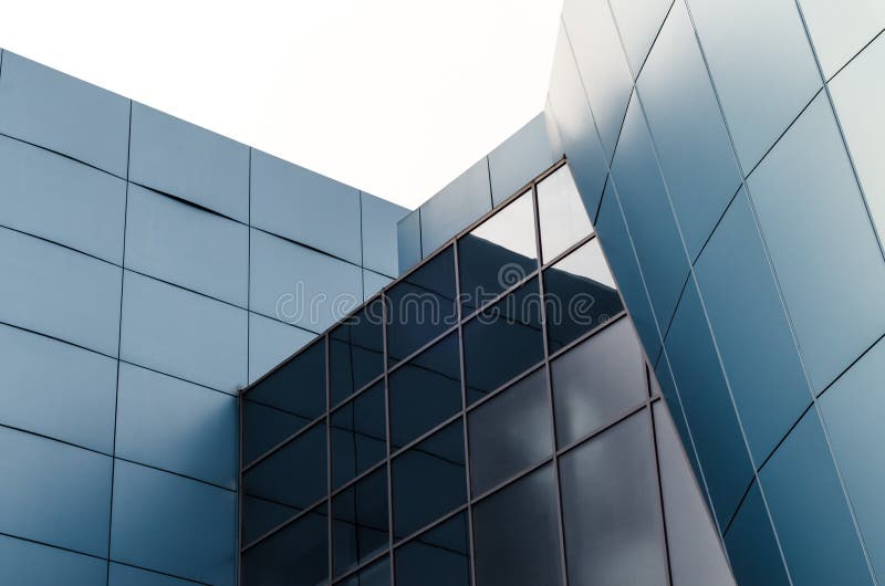 Facade of the Building with Blue Panels and Reflective Surfaces Stock ...
