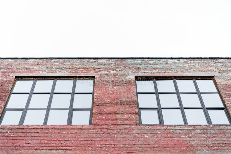Facade of the Building with Large Square Windows Stock Image - Image of ...