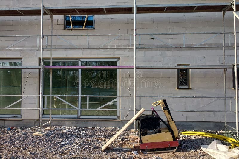Facade of Building Made from White Blocks with Big Windows Under ...