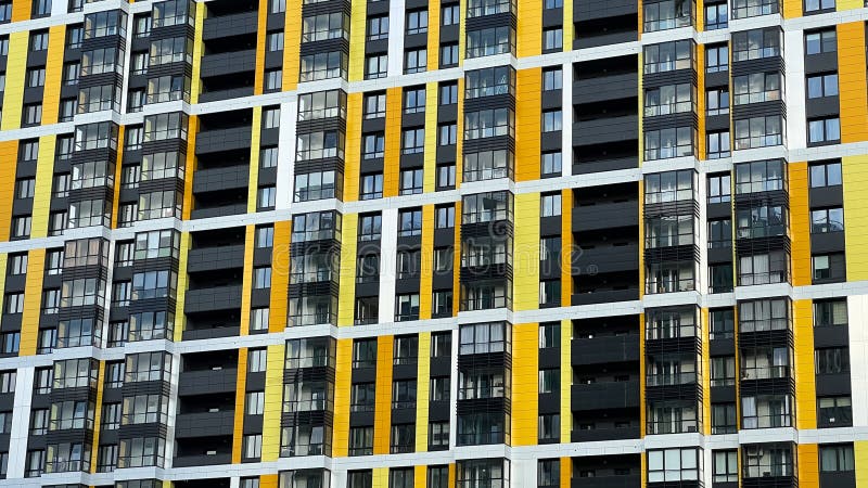 Facade of the Building in Yellow and Orange Colors, Geometric Patterns ...