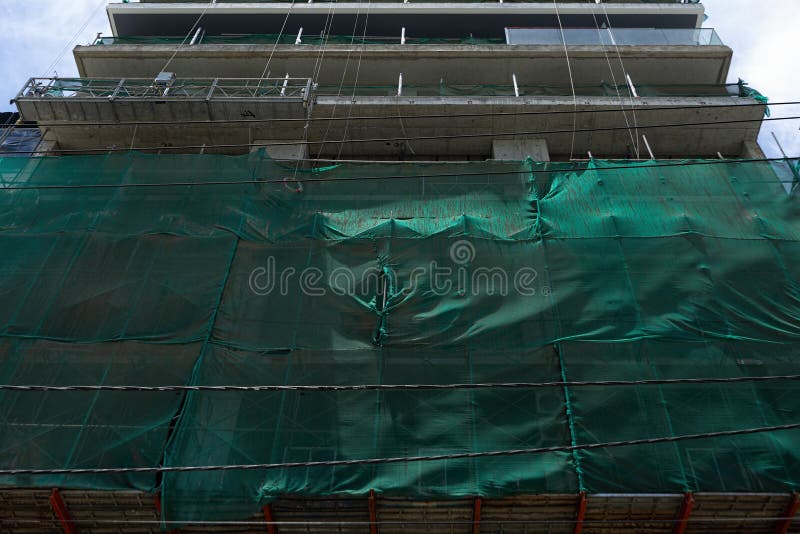 A Construction Mesh that Prevents Objects from Falling from a Building ...