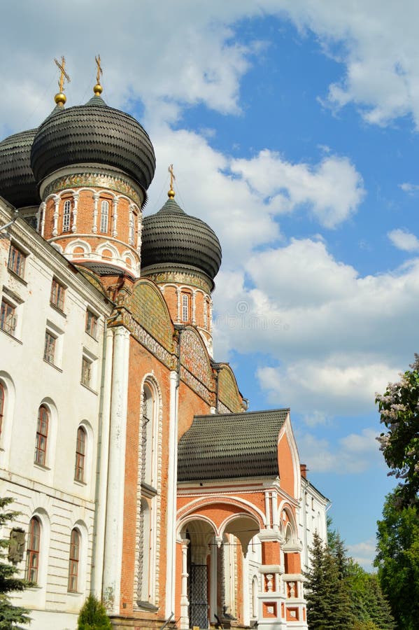 Facade and Domes of an Old Brick Christian Church Outside Stock Photo ...